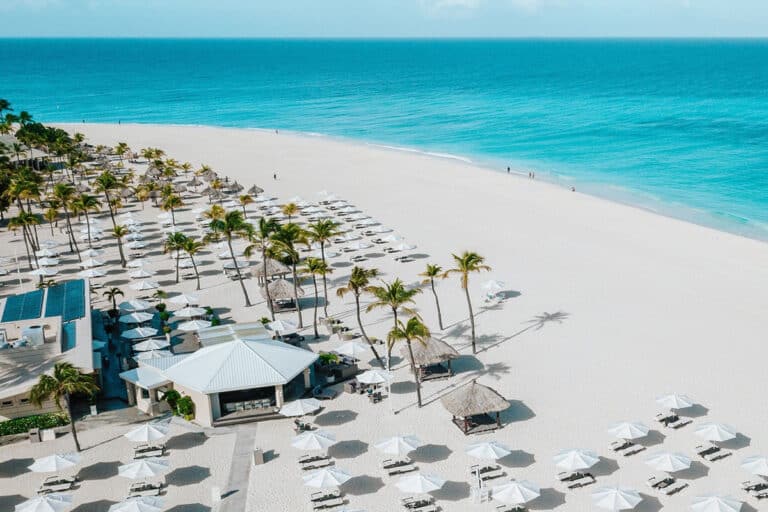 This Aruba Hotel Is the Only Hotel on Earth With Two Perfect Green ...